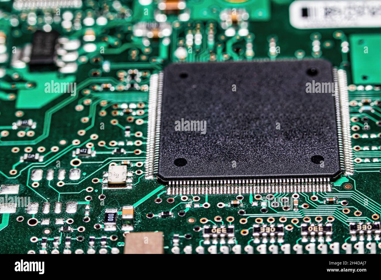 Microchips integrated on the board. The microcircuit photographed in ...