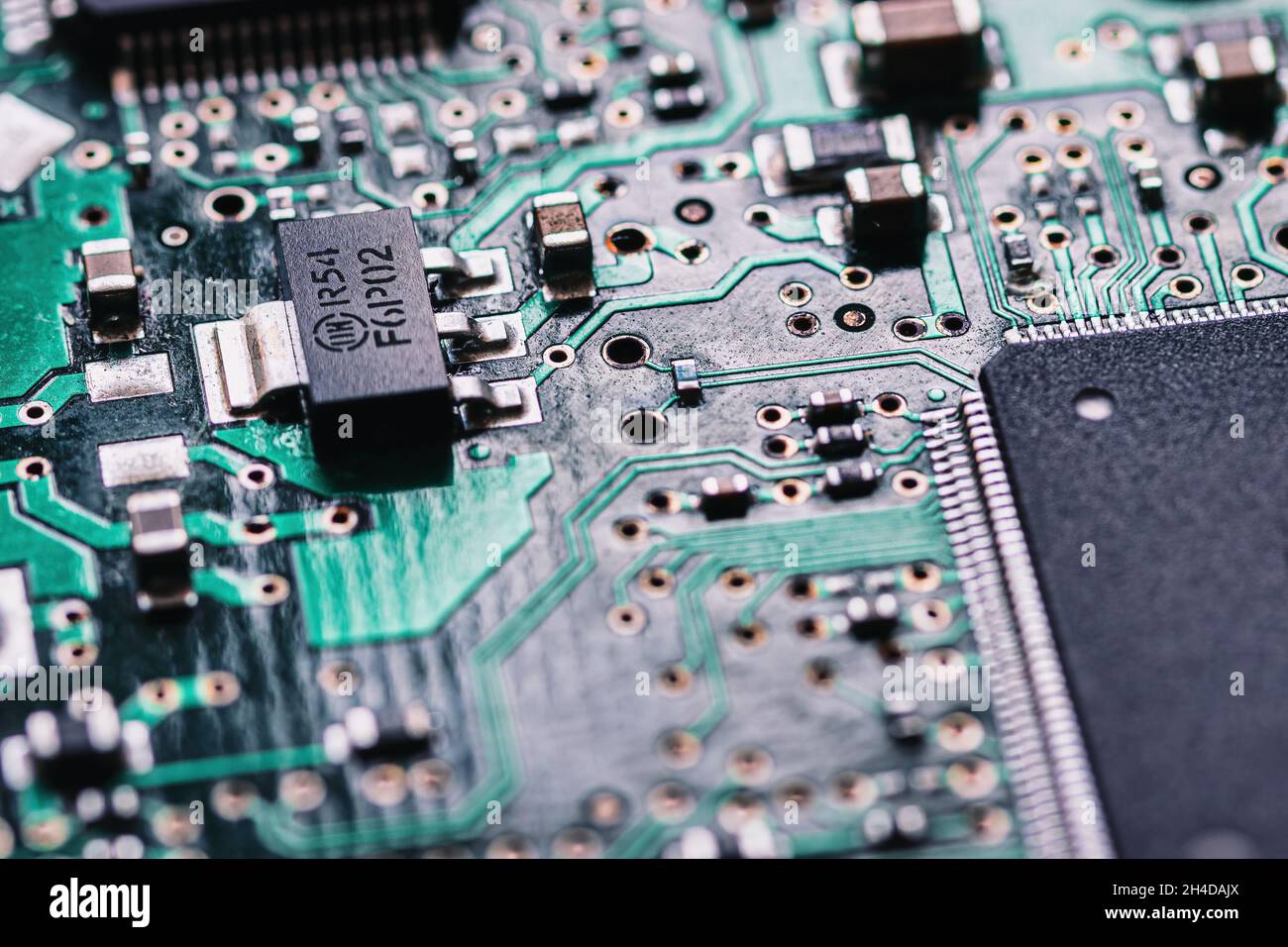 Microchips integrated on the board. The microcircuit photographed in ...