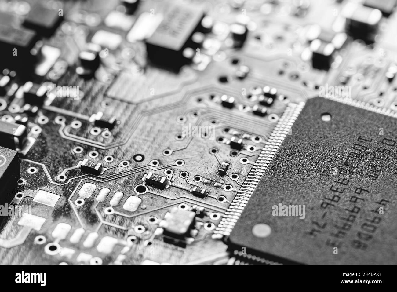 Microchips integrated on the board. The microcircuit photographed in ...