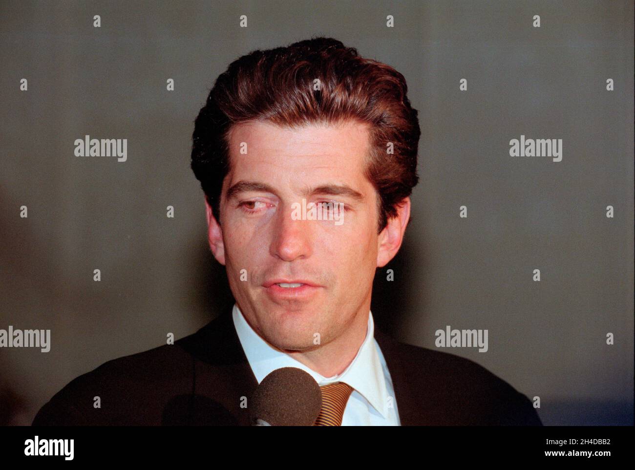 John F. Kennedy, Jr. speaks to reporters following his surprise, one ...