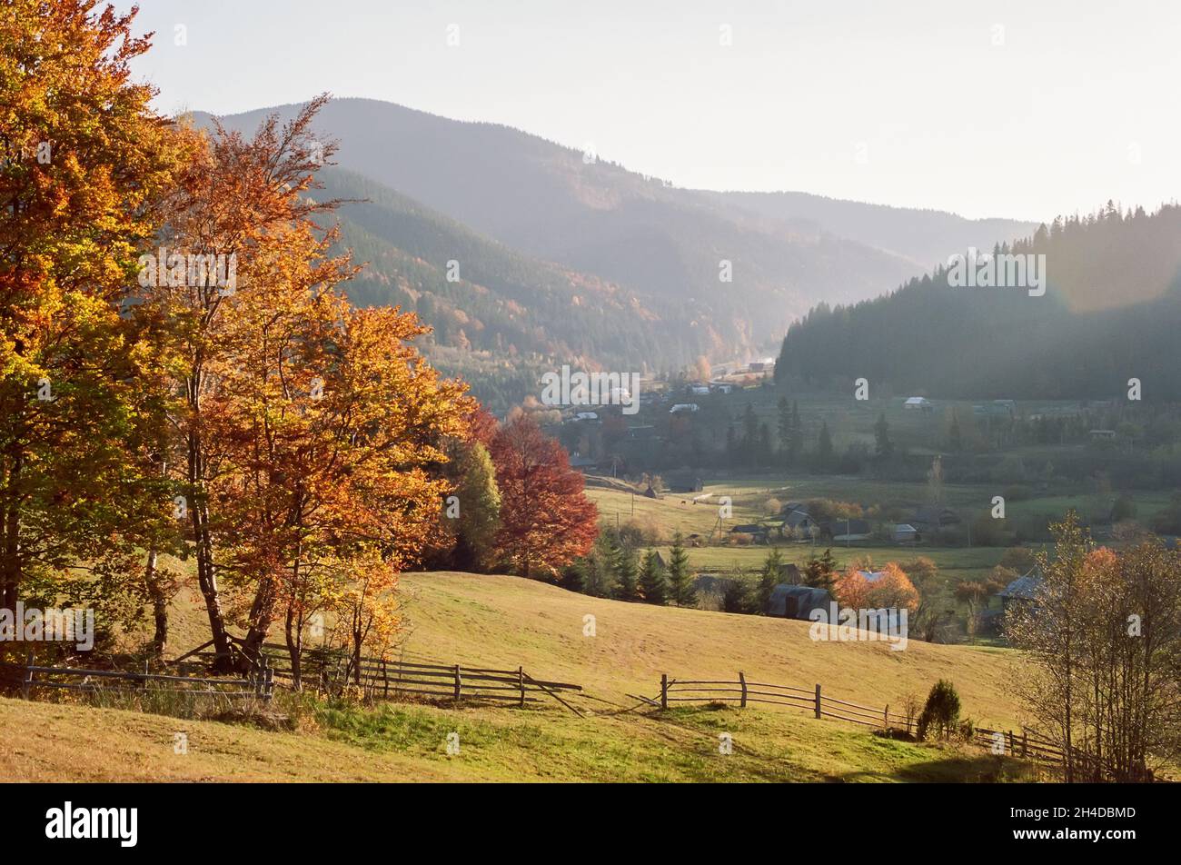 Beautiful golden sunrise in an autumn mountain landscape. Shoot on an ...