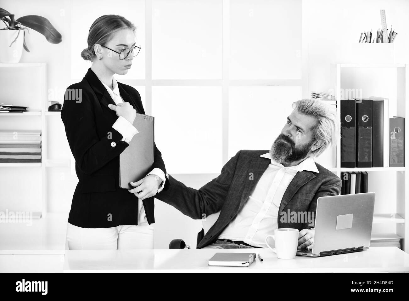 boss and employee. successful partnership. man and woman brainstorming ...