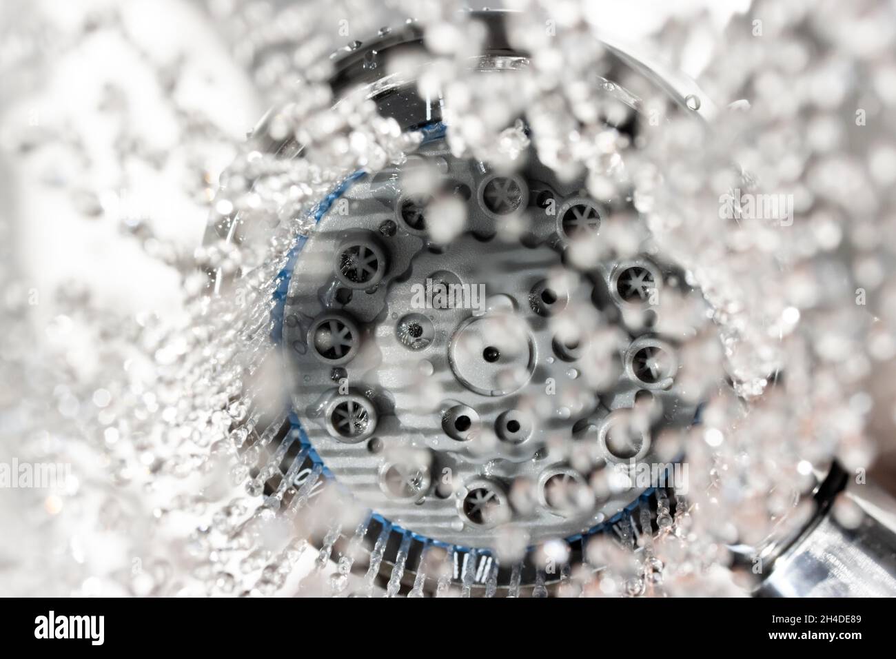 The water drops running from the shower head, close up view Stock Photo ...