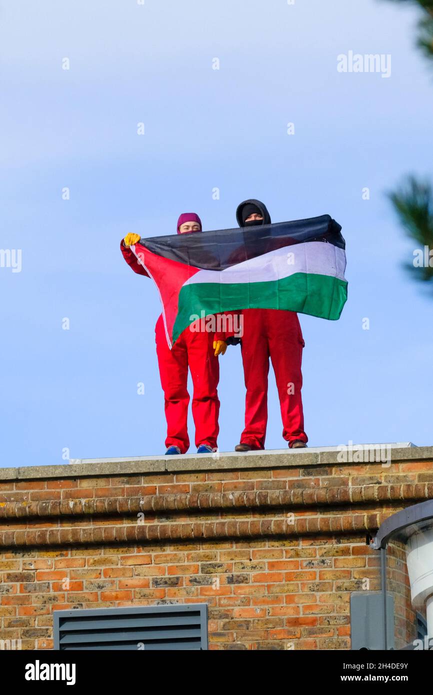 Aztec West Business Park, Bristol, UK. 2nd Nov, 2021. Two protestors ...