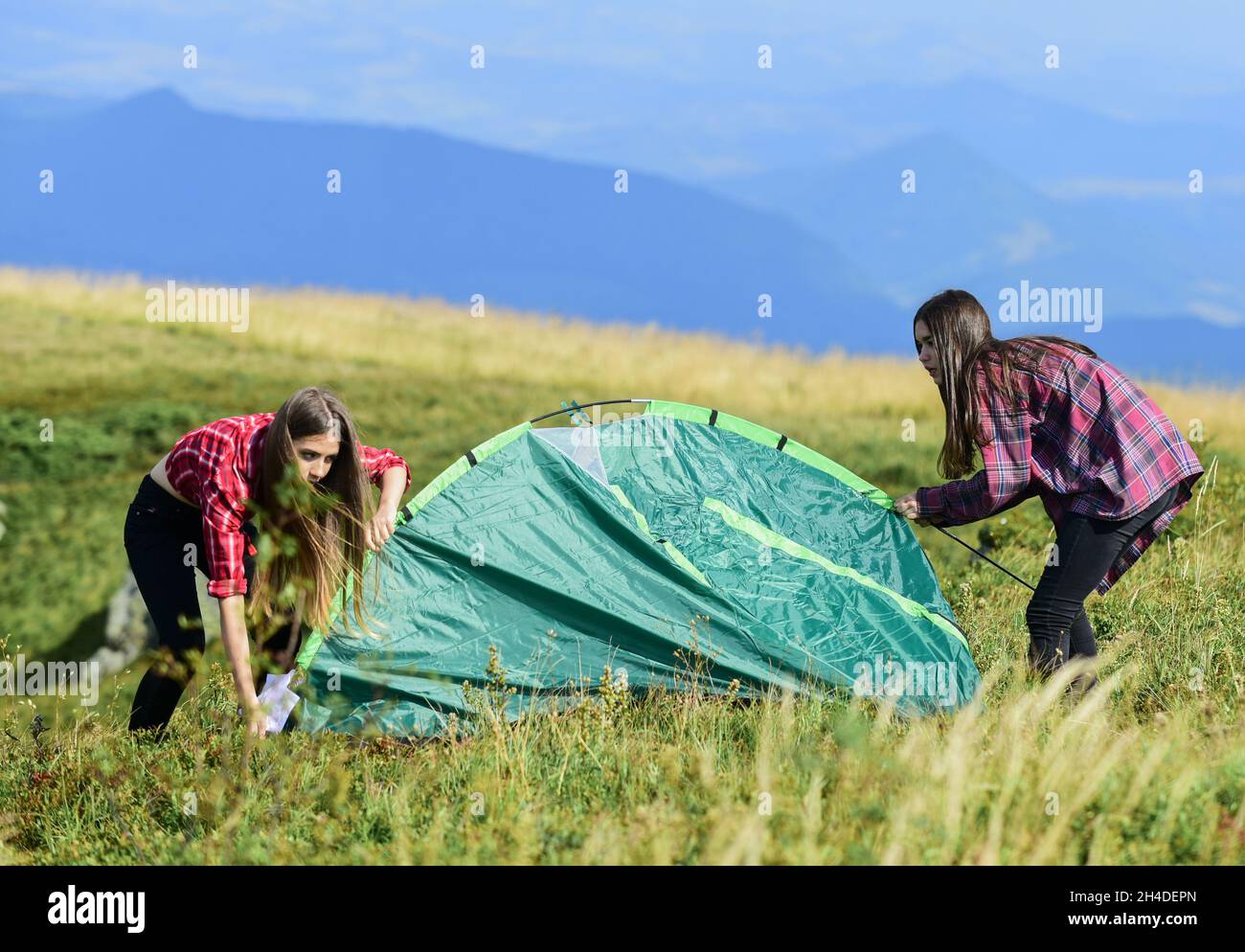 Camping trip. Helpful to have partner for raising tent. Camping skills ...