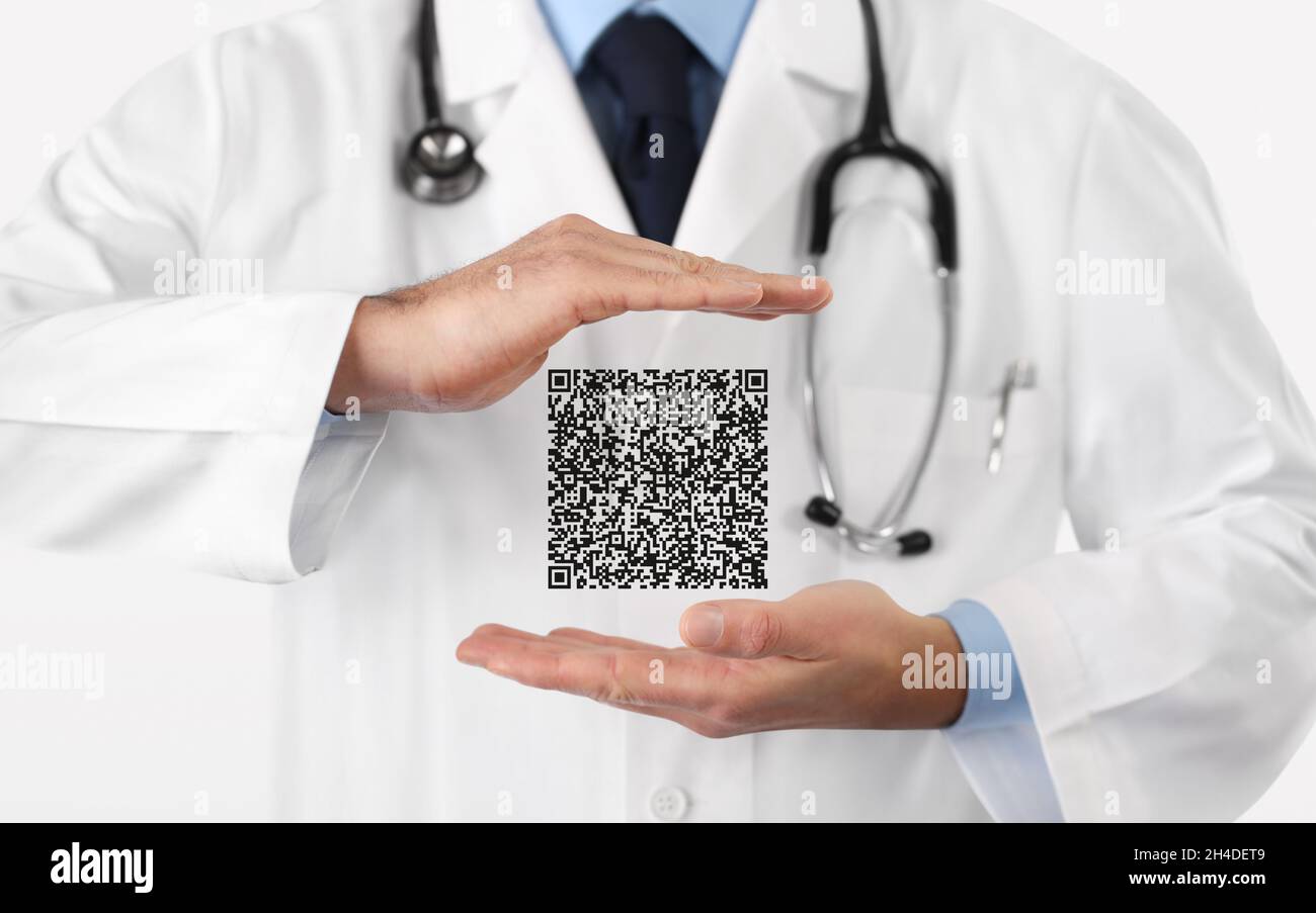 Green pass covid-19 vaccination certificate concept, doctor hands show ...