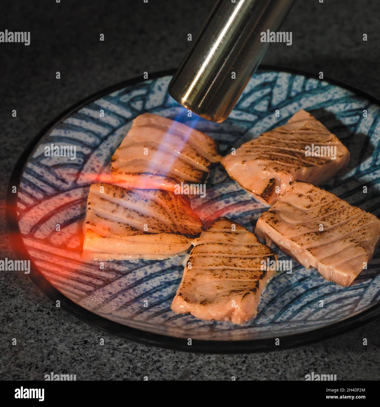 Blow torch seared salmon Stock Photo - Alamy