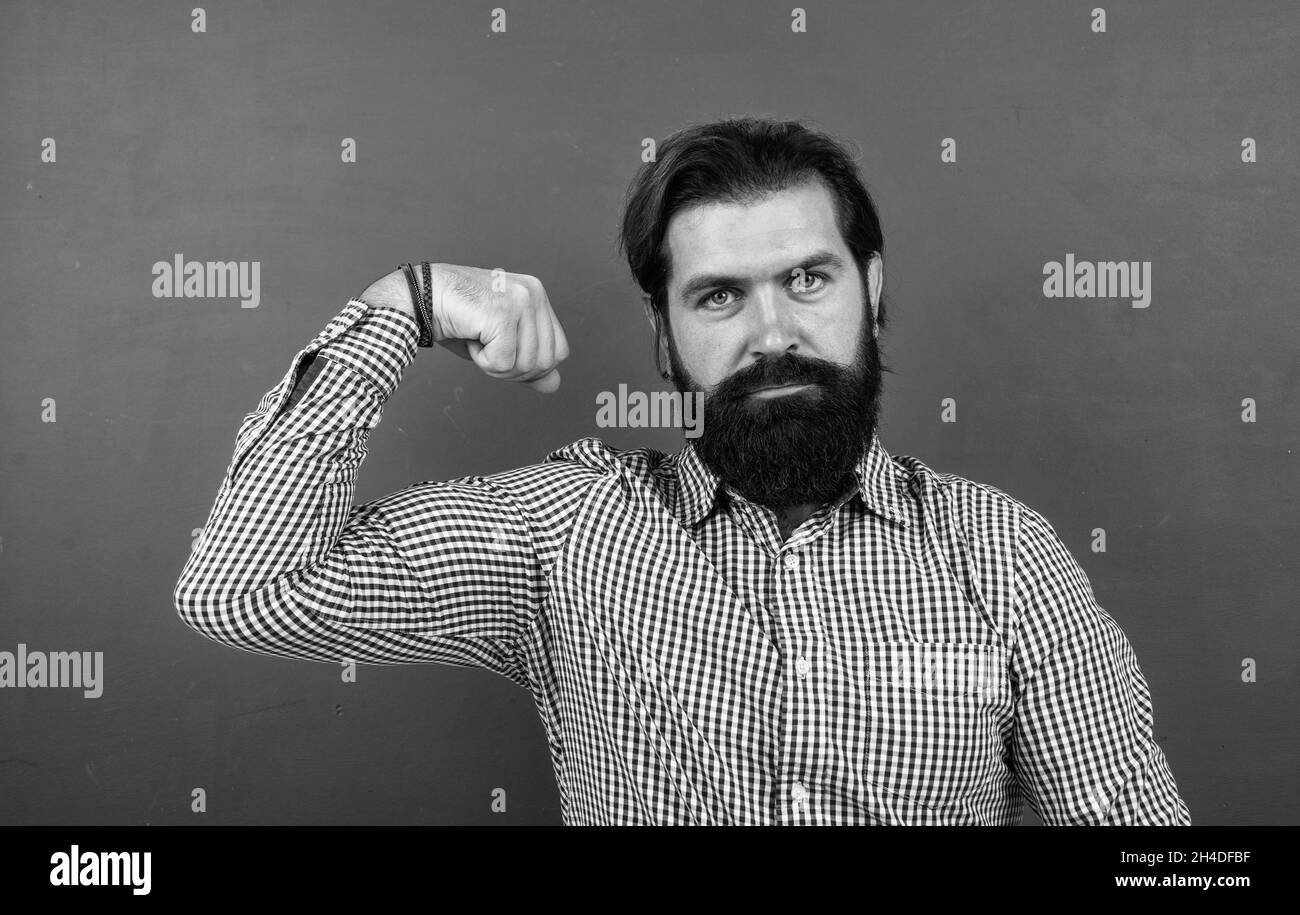 confident man showing biceps demonstrating power, male strength Stock ...