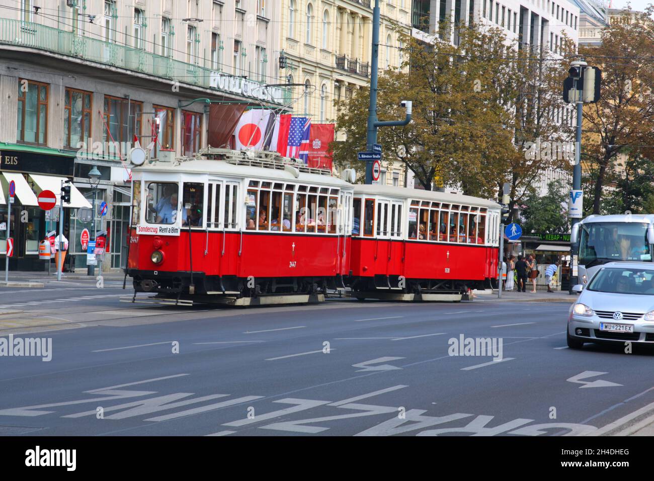 Old red tram streetcar tour in Vienna downtown, Austria Stock Photo - Alamy