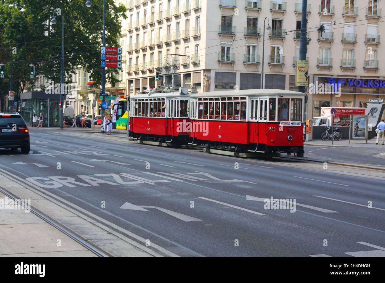 Old red tram streetcar tour in Vienna downtown, Austria Stock Photo - Alamy