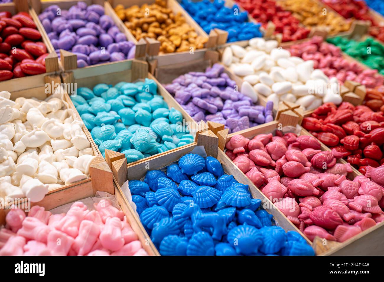 Handmade soaps in different shapes and colours in wooden boxes for sale ...