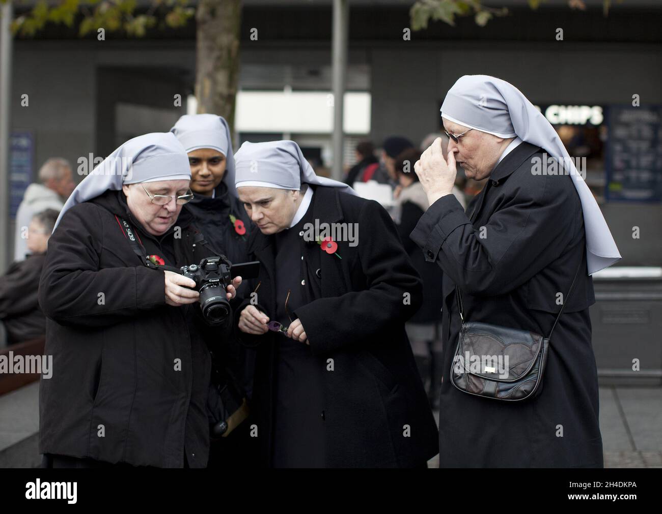 A group of nuns visit the art installation 'Blood Swept Lands and Seas ...