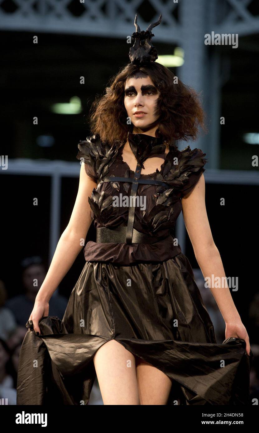 A model dressed in clothing made from chocolate at the catwalk in The ...