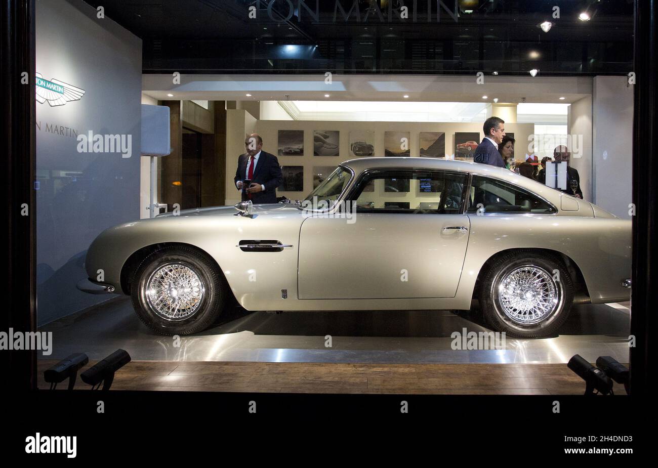 Aston Martins are exhibited in the new display on the Harrods ...