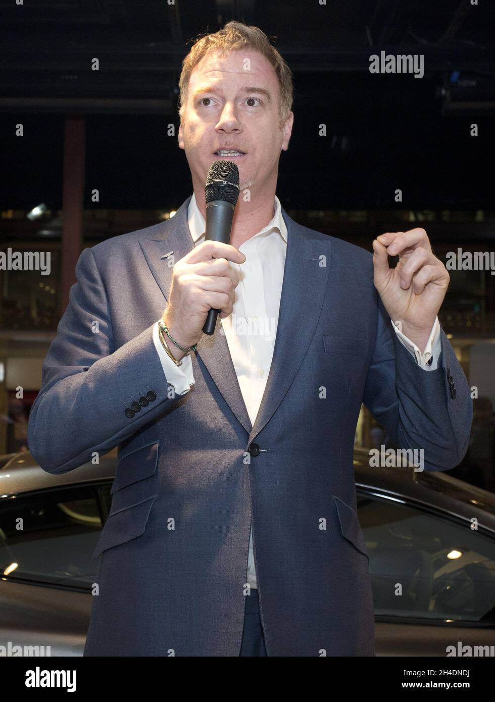 Aston Martin Mark Reichman, chief creative officer, gives a speech at ...
