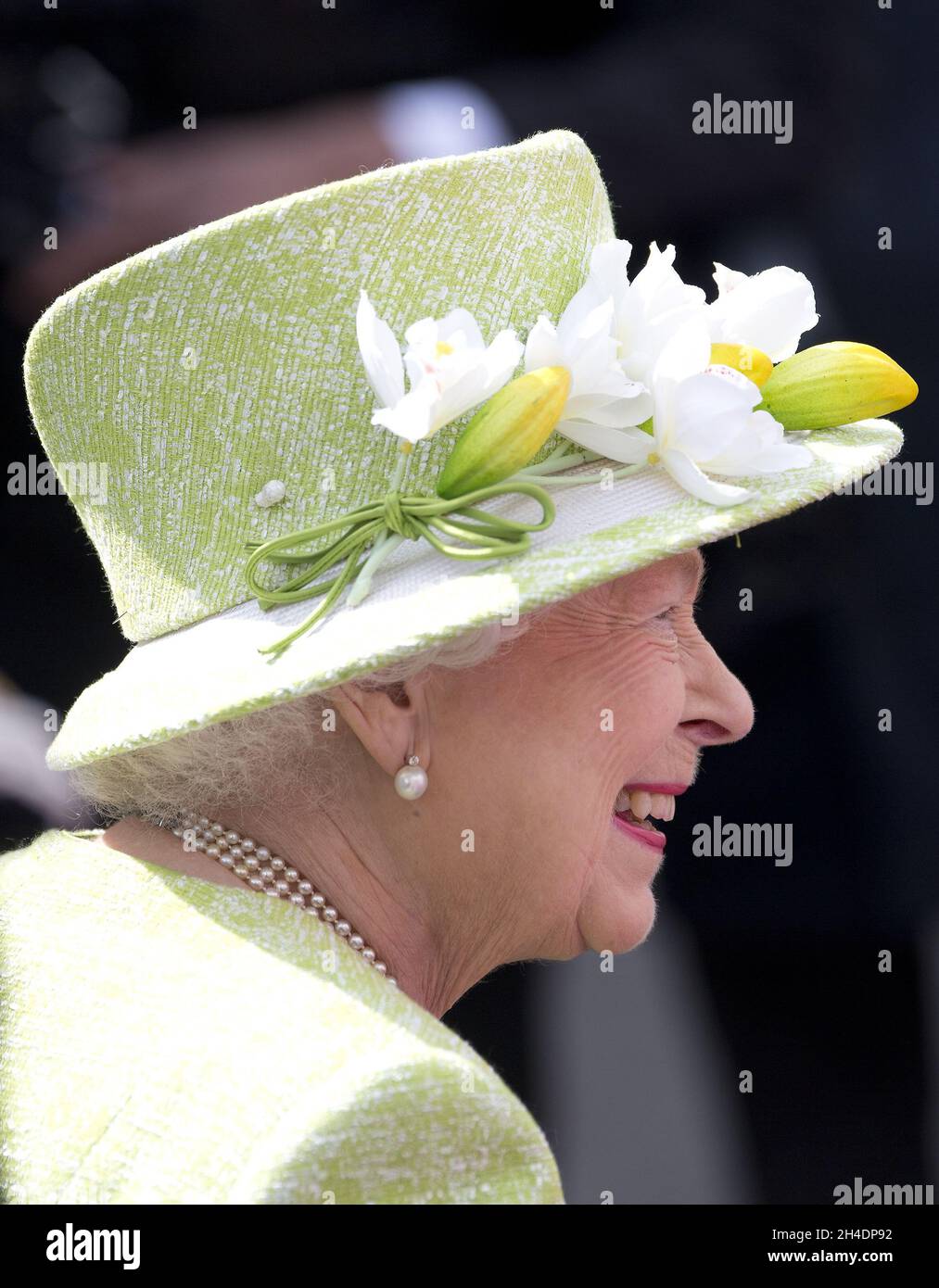 The Queen Elizabeth II greets the crowd lined outside Windsor Castle ...