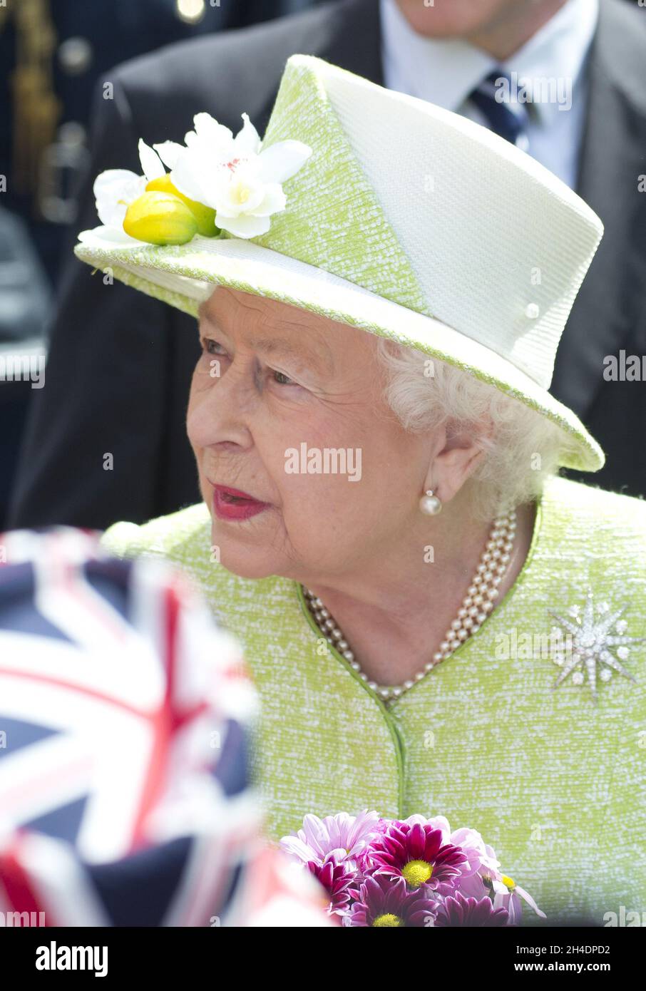 The Queen Elizabeth II greets the crowd lined outside Windsor Castle ...