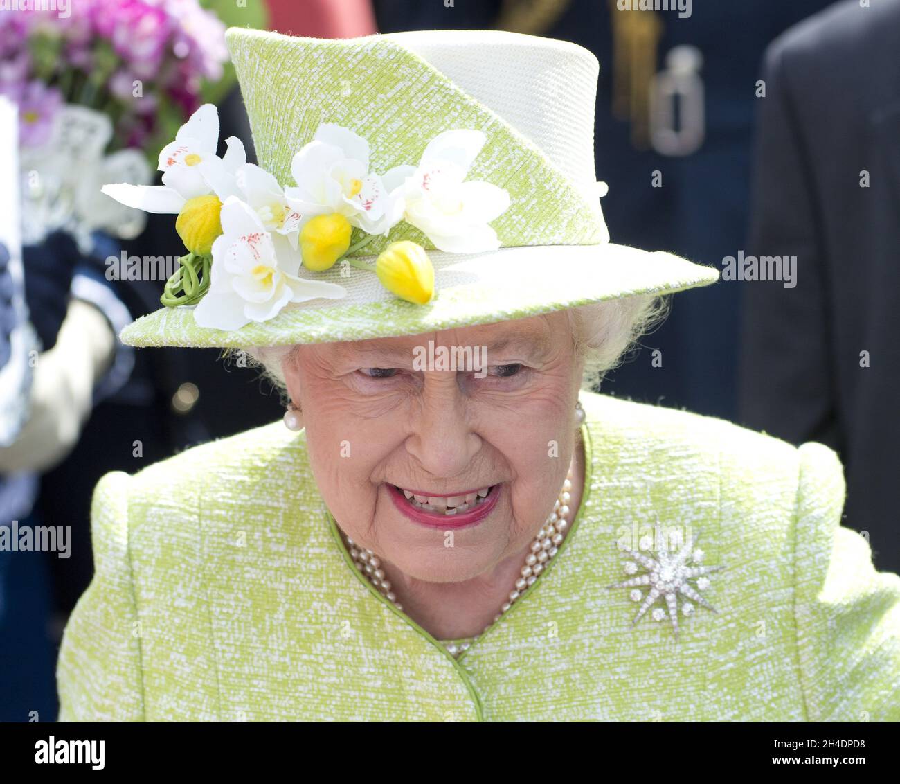 The Queen Elizabeth II greets the crowd lined outside Windsor Castle ...