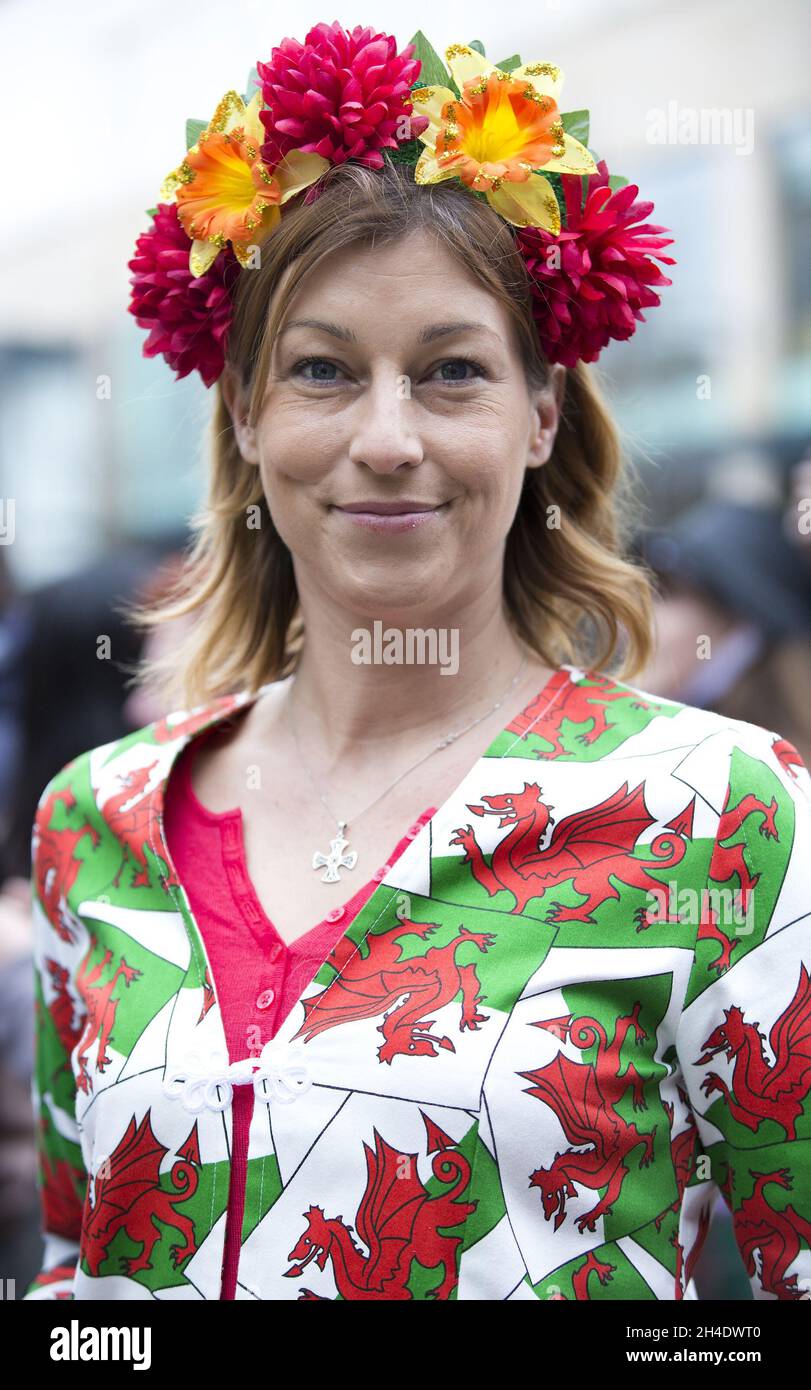 A patriotic Welsh woman wears a dress printed with Red Dragon flags ...