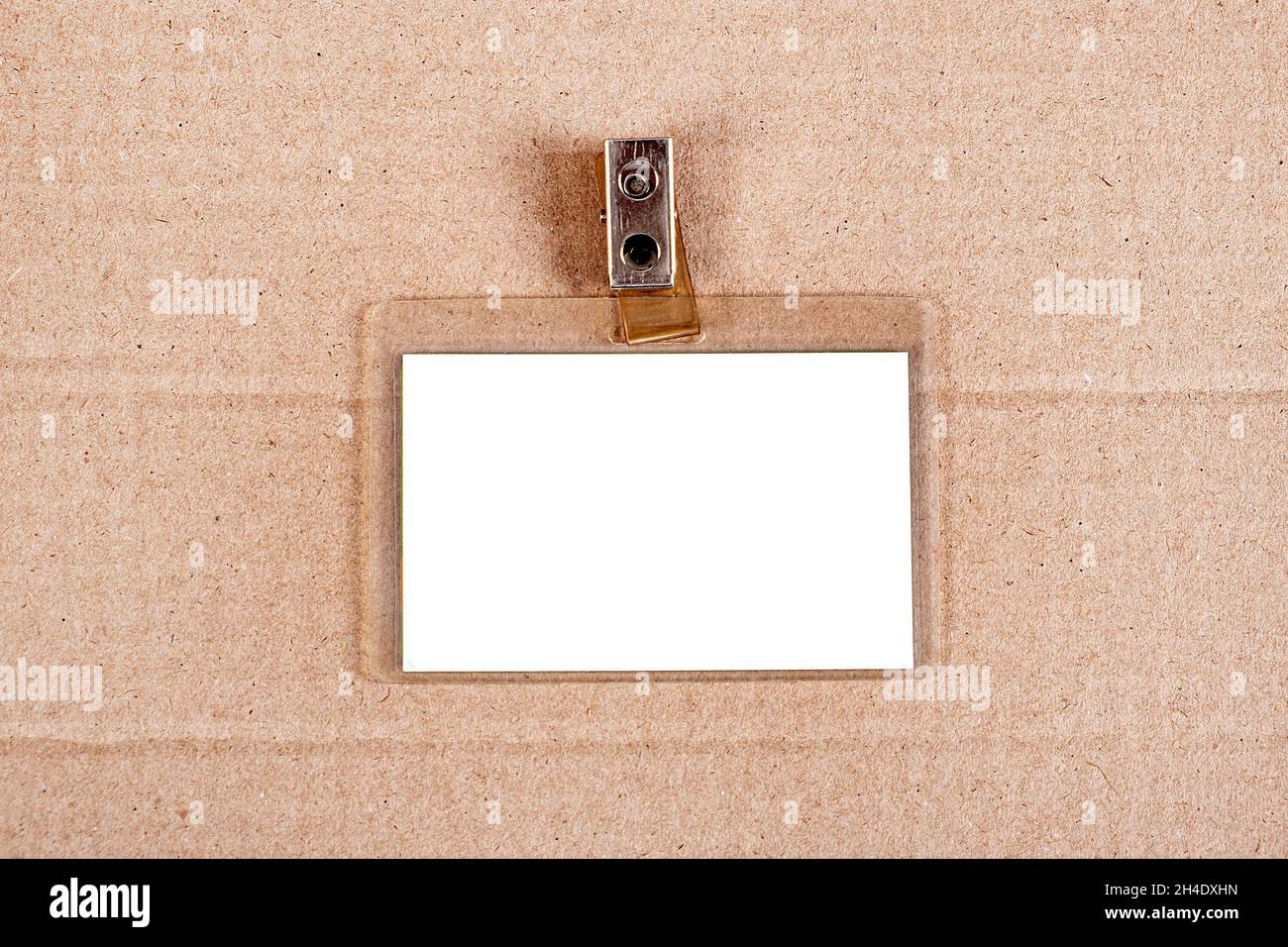 Blank Badge on the Cardboard Background closeup Stock Photo - Alamy