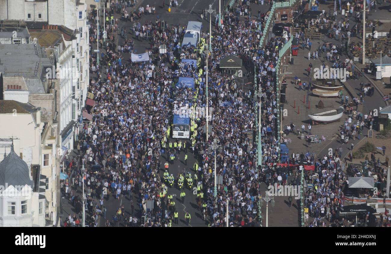 Brighton and Hove Albion football team goes in a seafront open-top bus ...