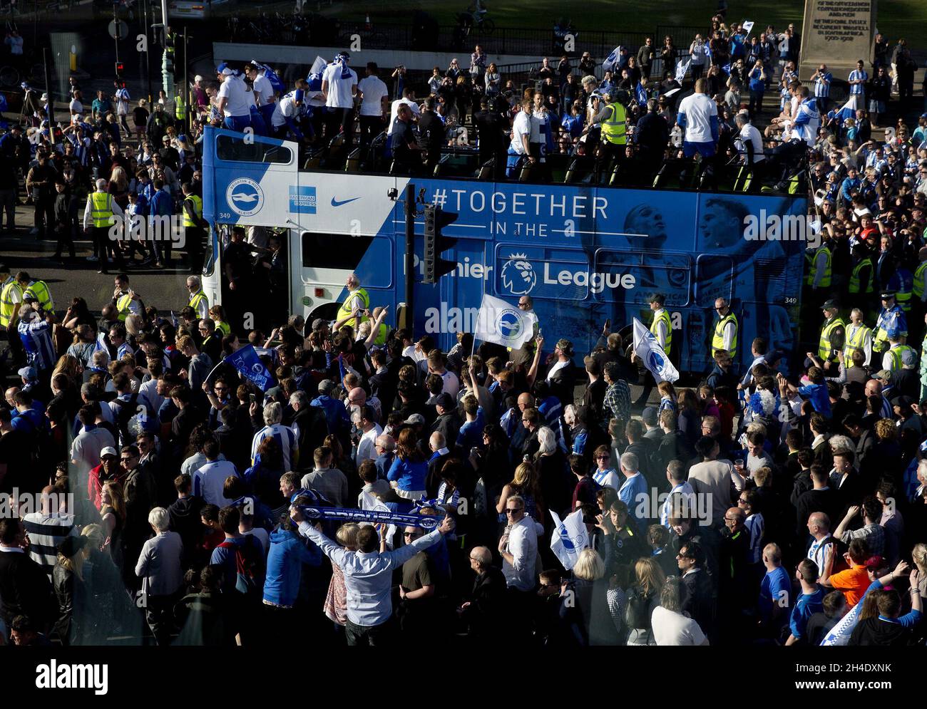 Brighton and Hove Albion football team goes in a seafront open-top bus ...