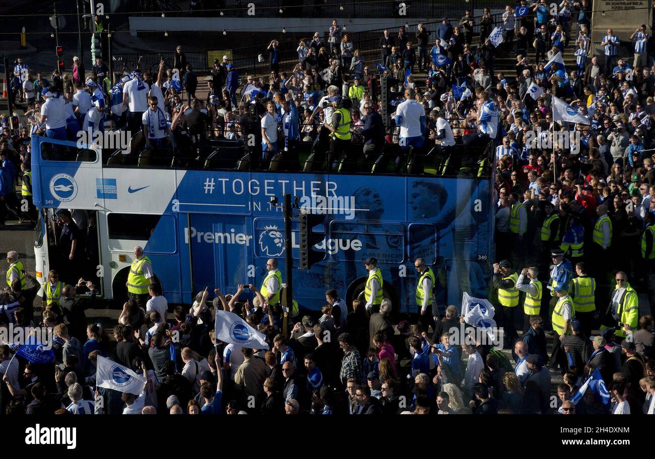 Brighton and Hove Albion football team goes in a seafront open-top bus ...