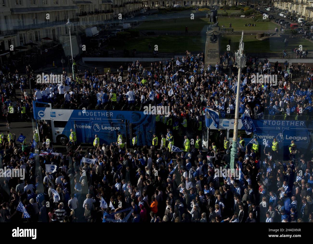 Brighton and Hove Albion football team goes in a seafront open-top bus ...