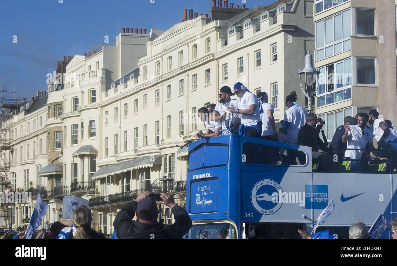 Brighton and Hove Albion football team goes in a seafront open-top bus ...