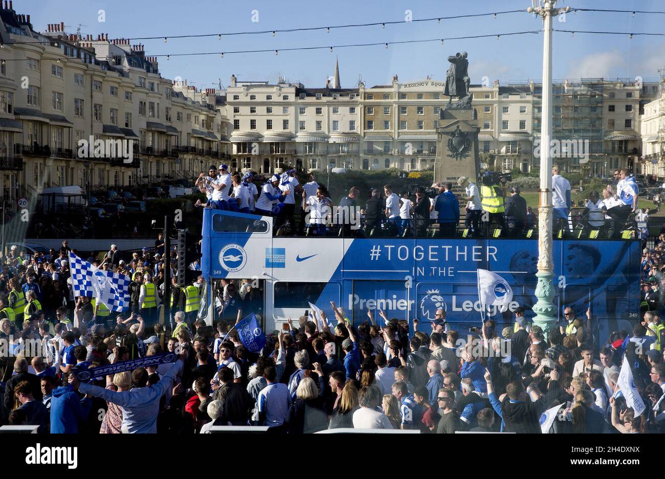 Brighton and Hove Albion football team goes in a seafront open-top bus ...