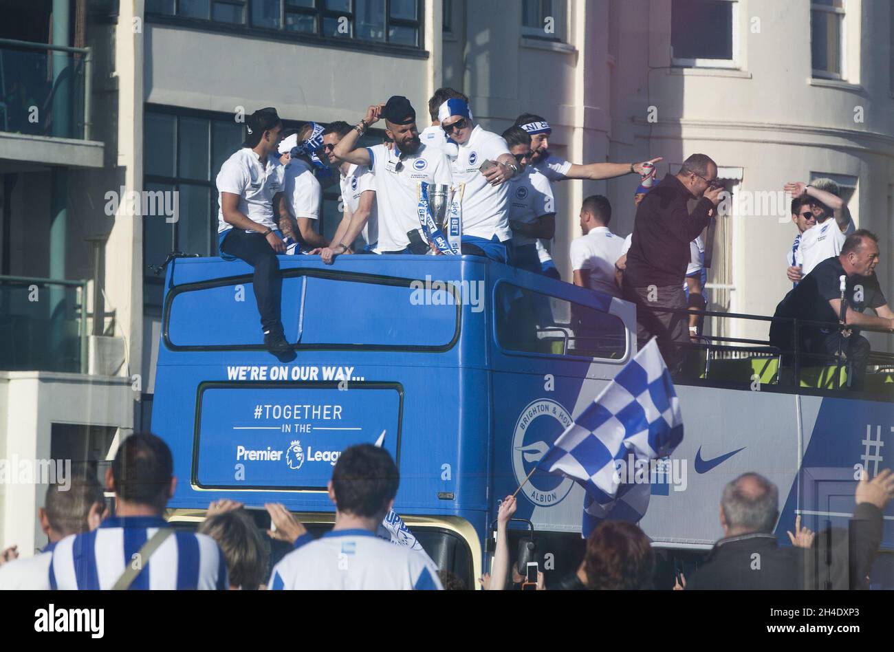 Brighton and Hove Albion football team goes in a seafront open-top bus ...