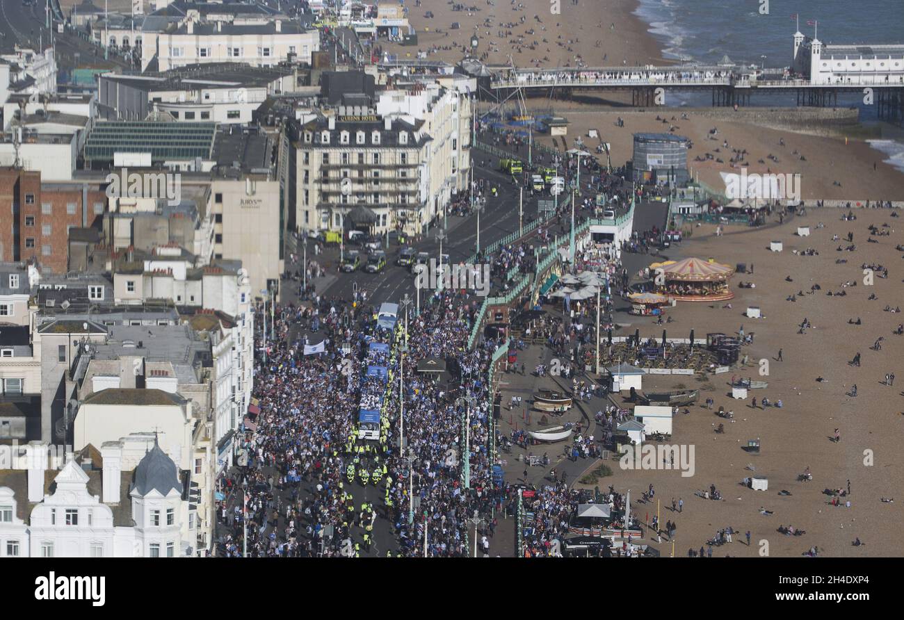 Brighton and Hove Albion football team goes in a seafront open-top bus ...