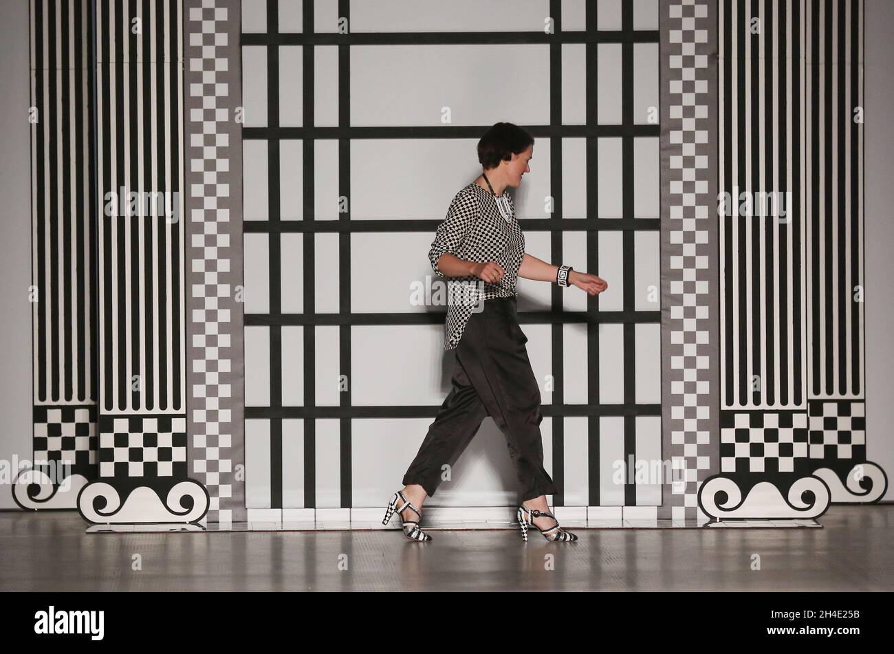 Holly Fulton acknowledges the audience after a retrospective catwalk ...