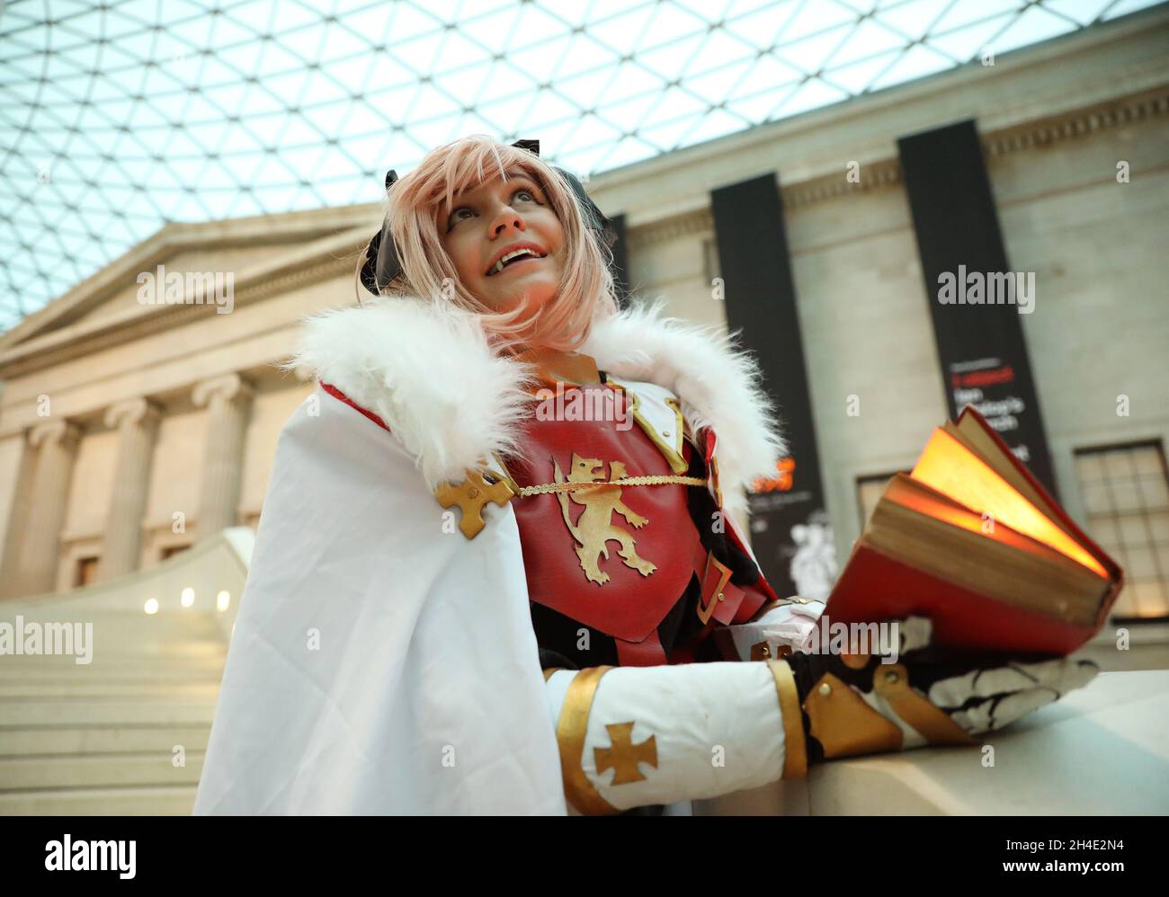 Cosplayer Tabatha Barton, dressed as Astolfo, strikes a pose during the ...