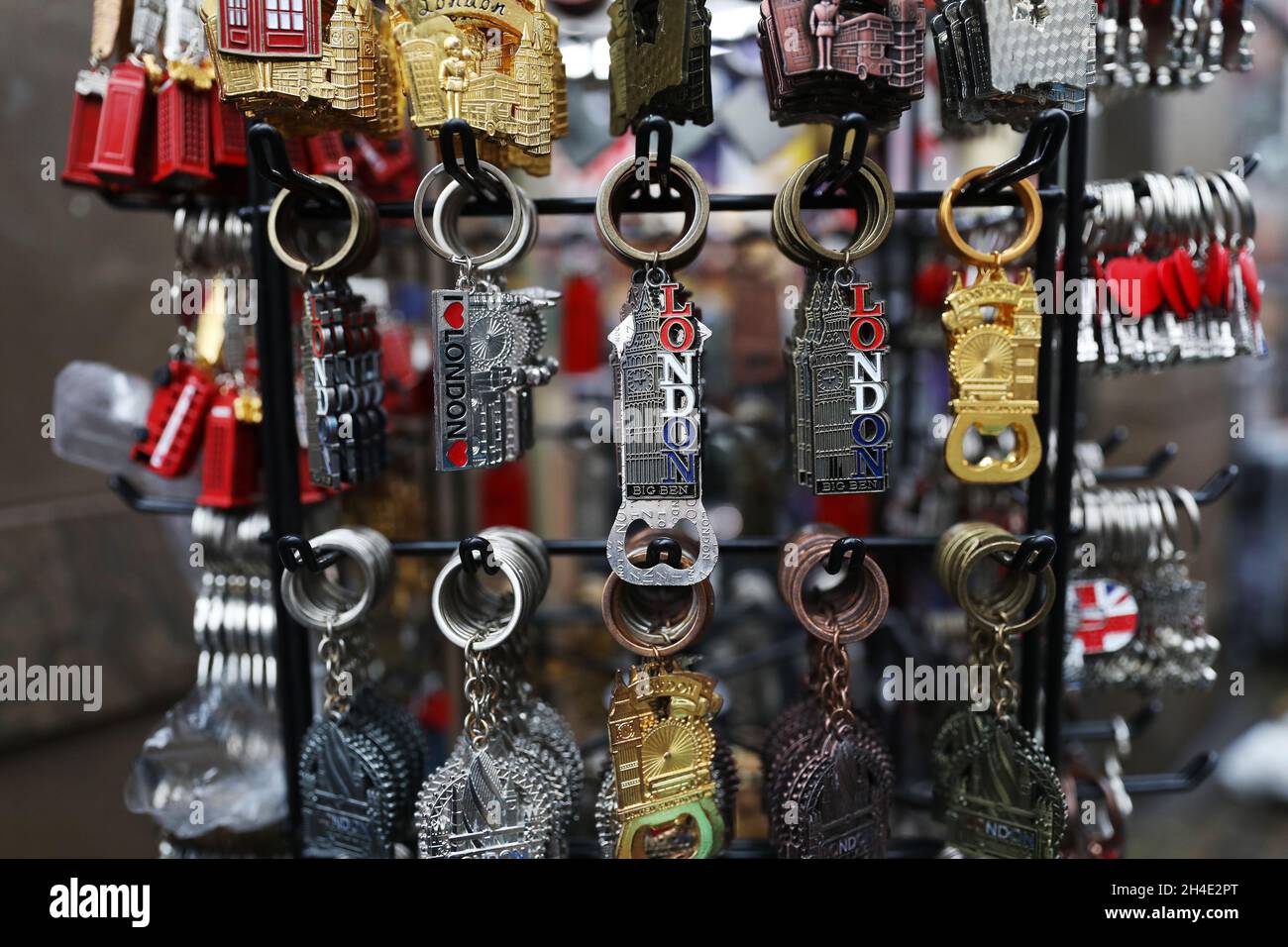 London souvenir key rings hang on display in a shop on Oxford Street ...