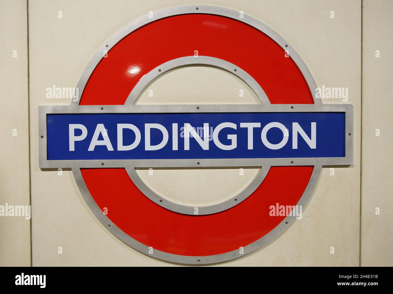An Underground station sign at Paddington train station in London ...