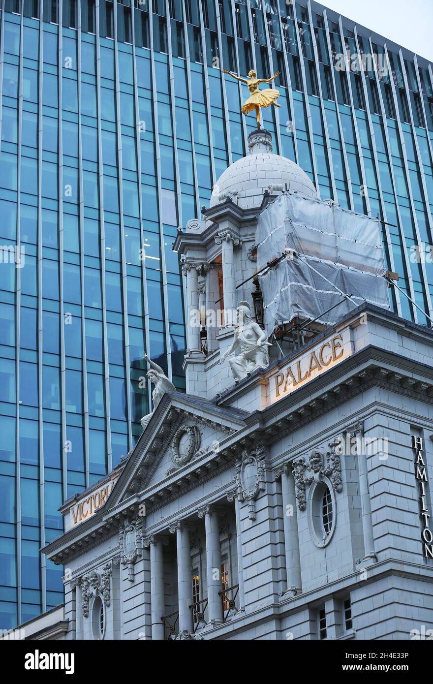 A gilded statue of ballerina Anna Pavlova installed on the Victoria Palace Theatre in London ...