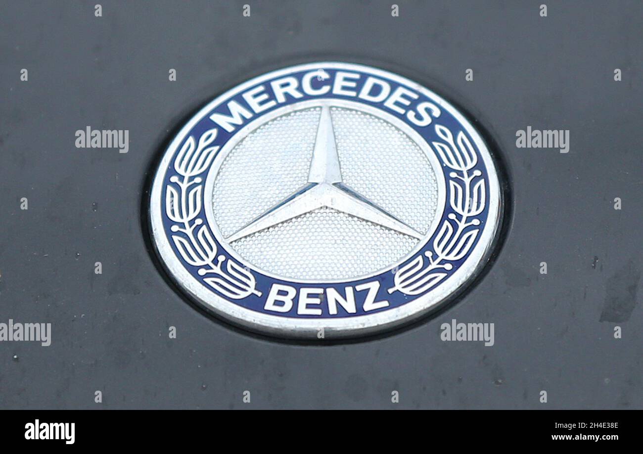 A close up of a Mercedes-Benz logo Stock Photo - Alamy