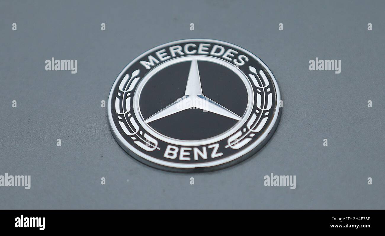 A close up of a Mercedes-Benz logo Stock Photo - Alamy