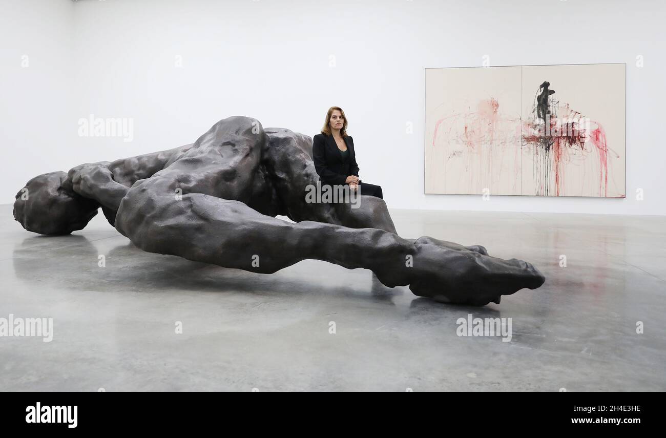 Tracey Emin pose next to 'I lay here for you' (bronze, 2018) at the ...
