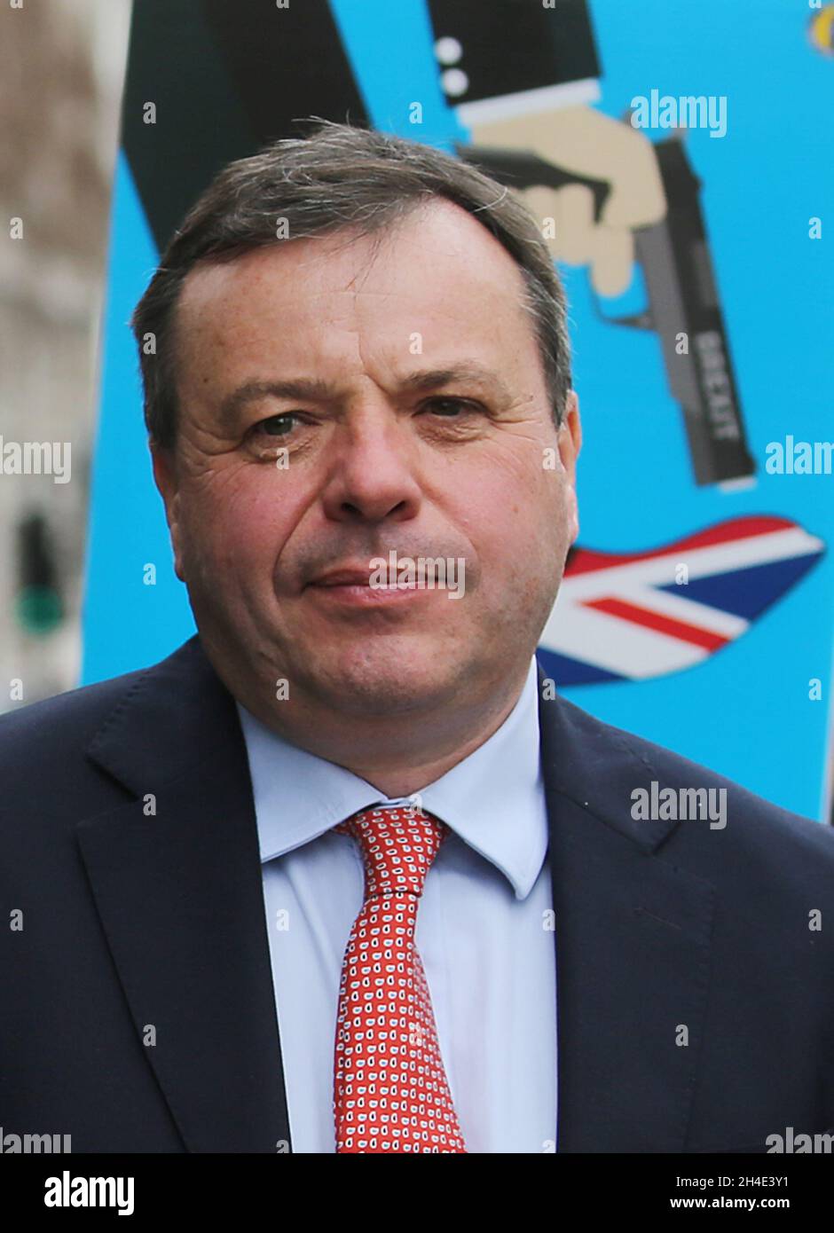 Leave.EU founder Arron Banks is followed by anti-Brexit campaigners as ...