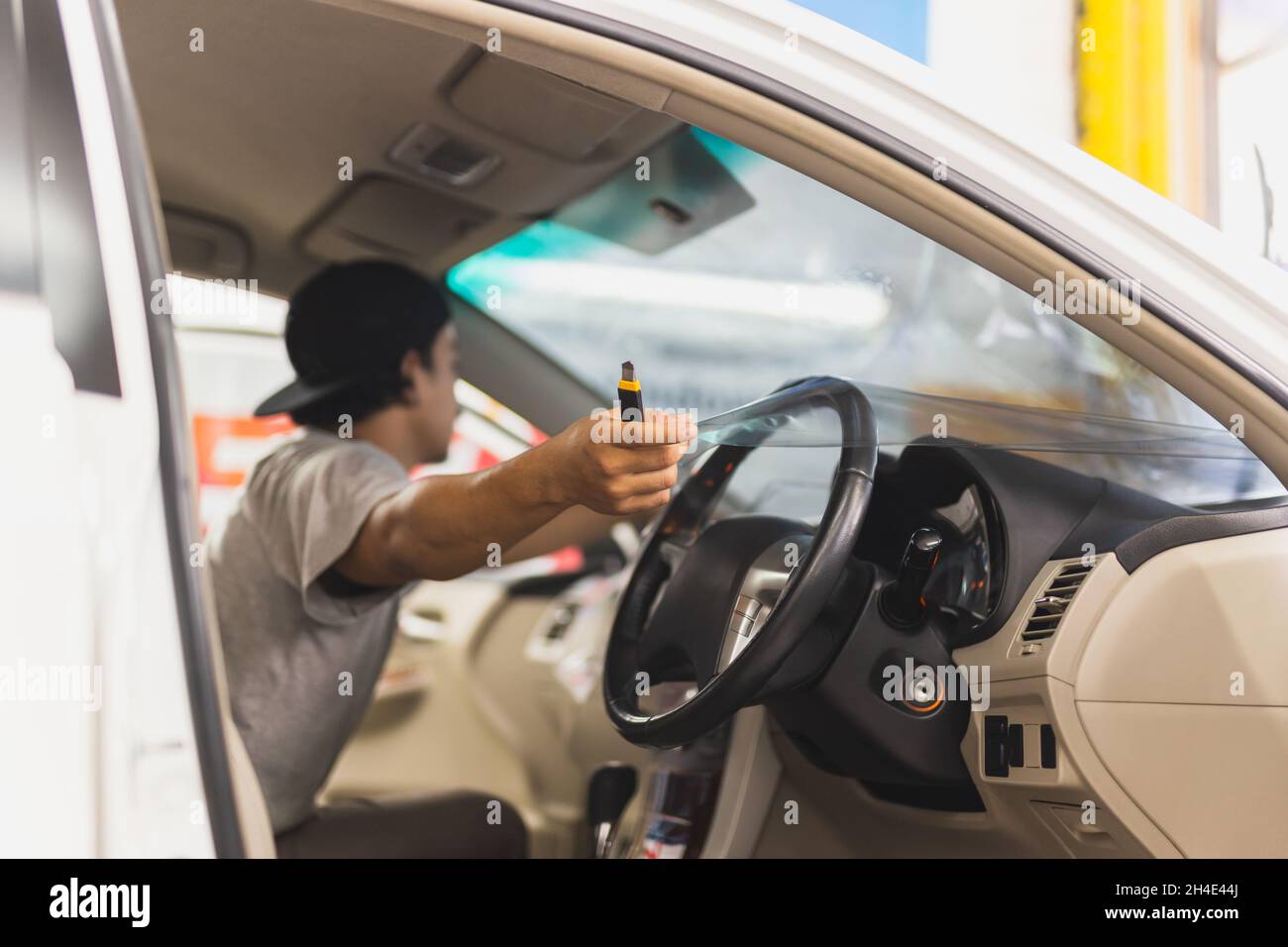 Car detailing specialist installing hi-res stock photography and images ...