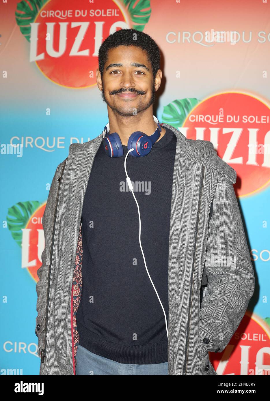 Alfred Enoch attending the Cirque du Soleil's red carpet premiere of ...