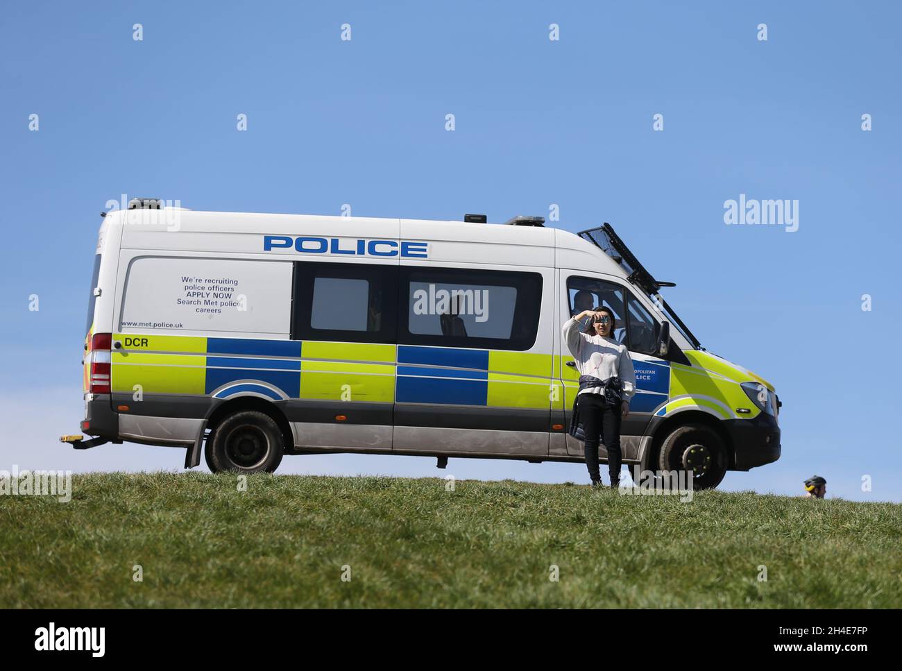 A police van is parked on Primrose Hill, north London, as the UK ...