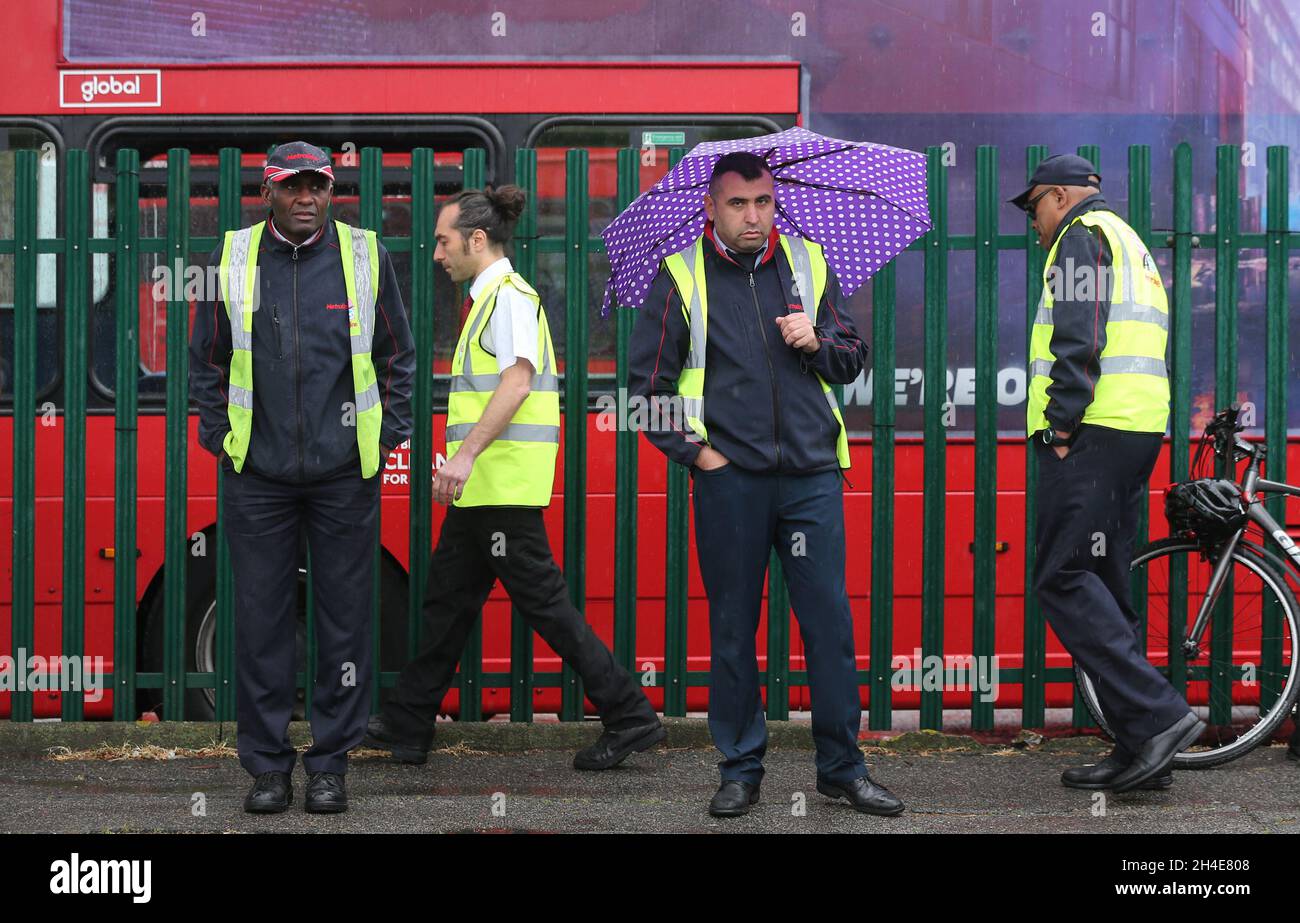 Metroline staff bus drivers gather outside Willesden Bus Garage in ...