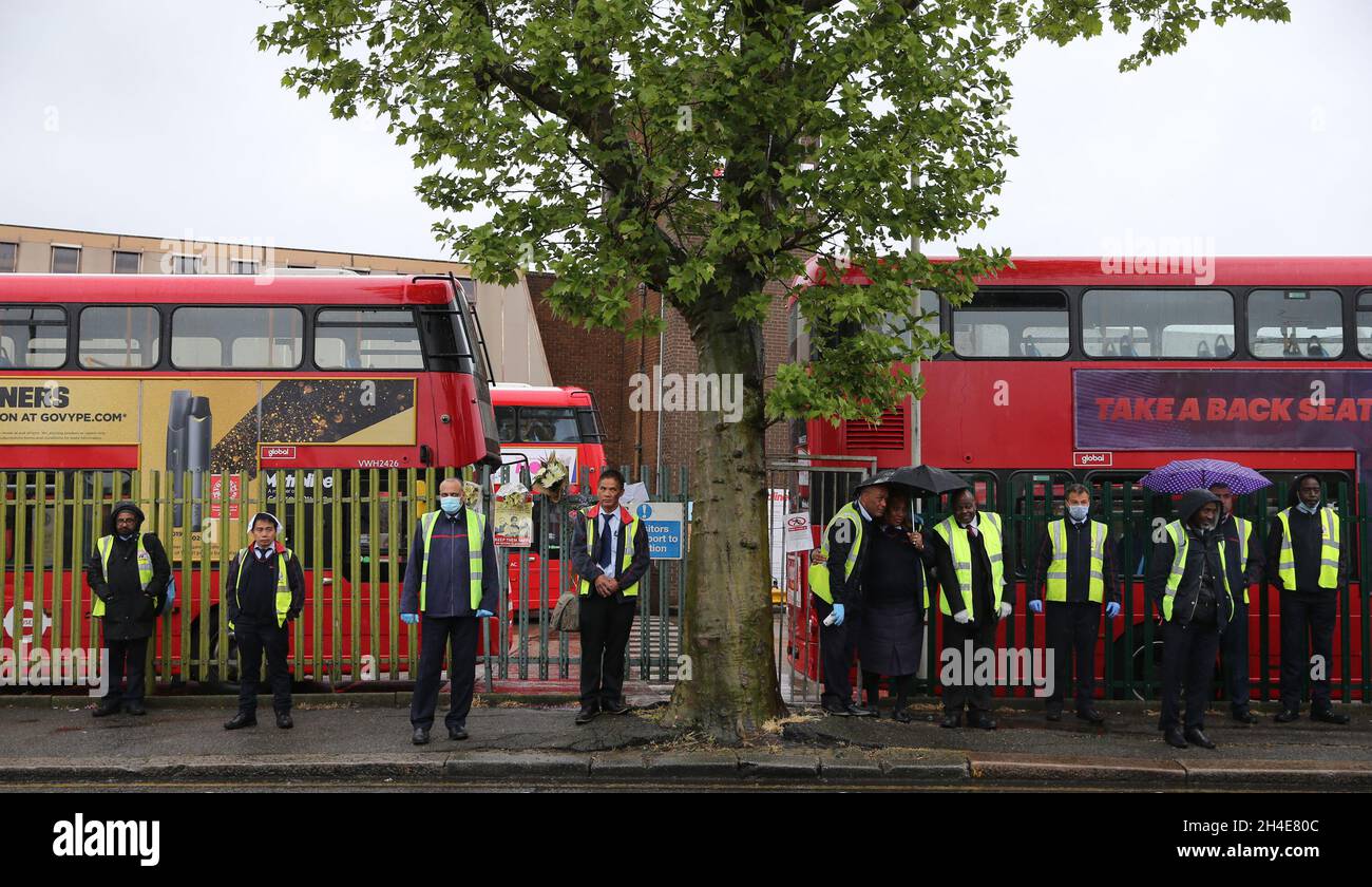 Metroline staff bus drivers gather outside Willesden Bus Garage in ...
