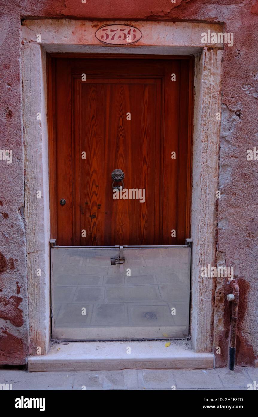 front door with flood defence in Venice italy Stock Photo - Alamy