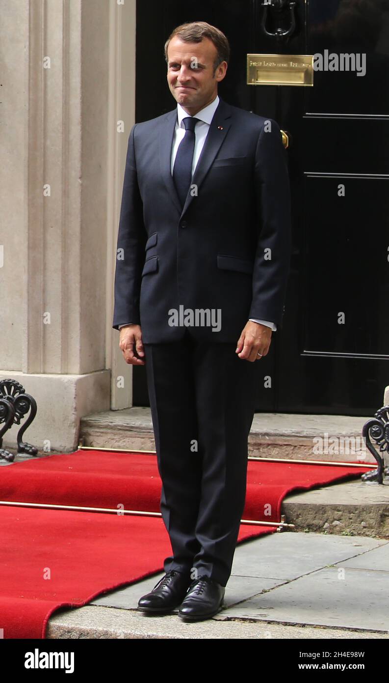 French president Emmanuel Macron outside Downing Street in London ...