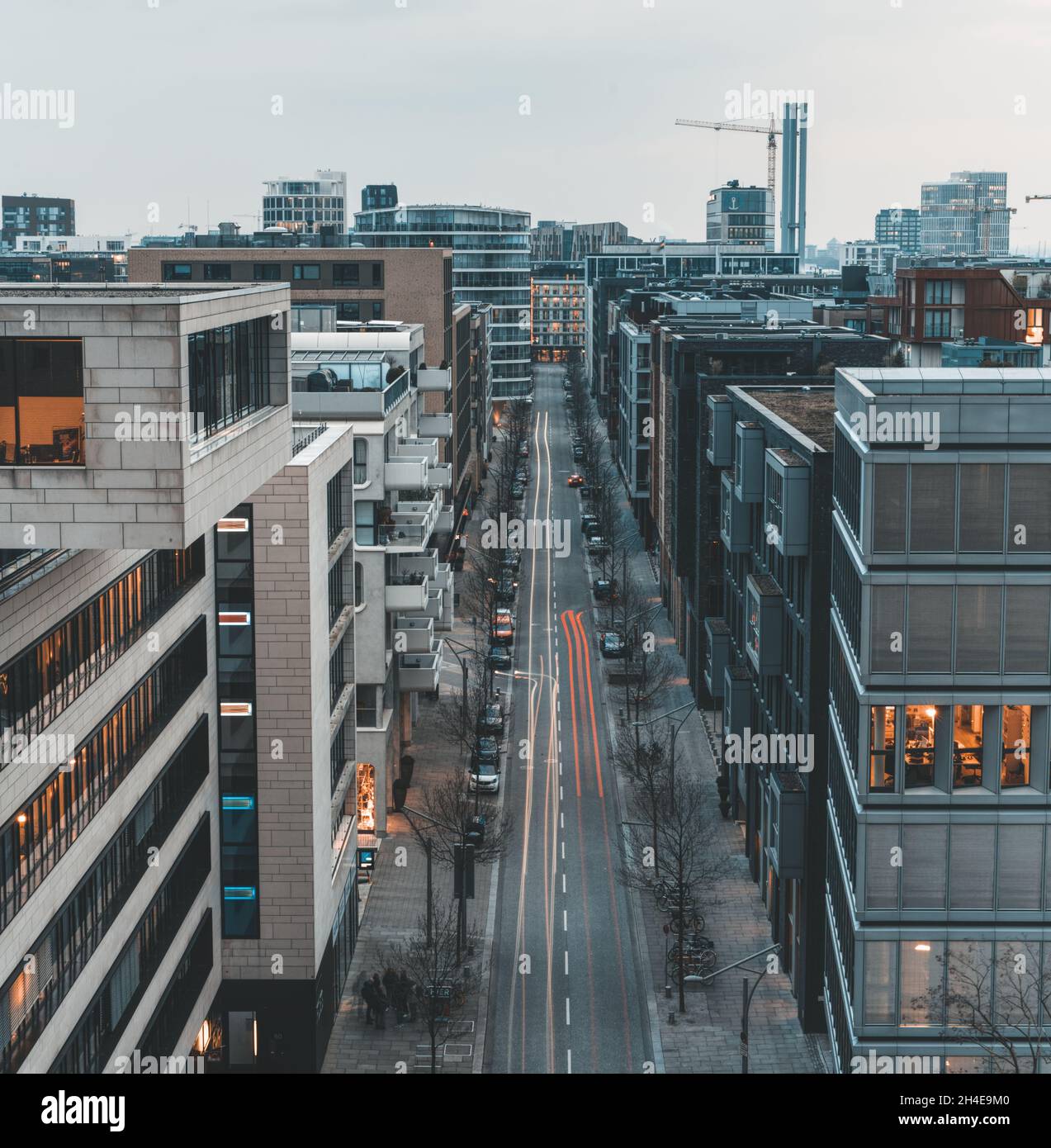 Aerial view of a road between residential buildings Stock Photo - Alamy