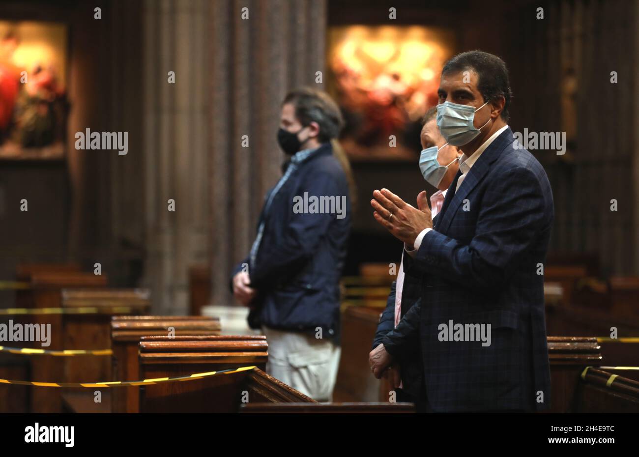 Churchgoers wearing a protective face mask as Personal Protective ...